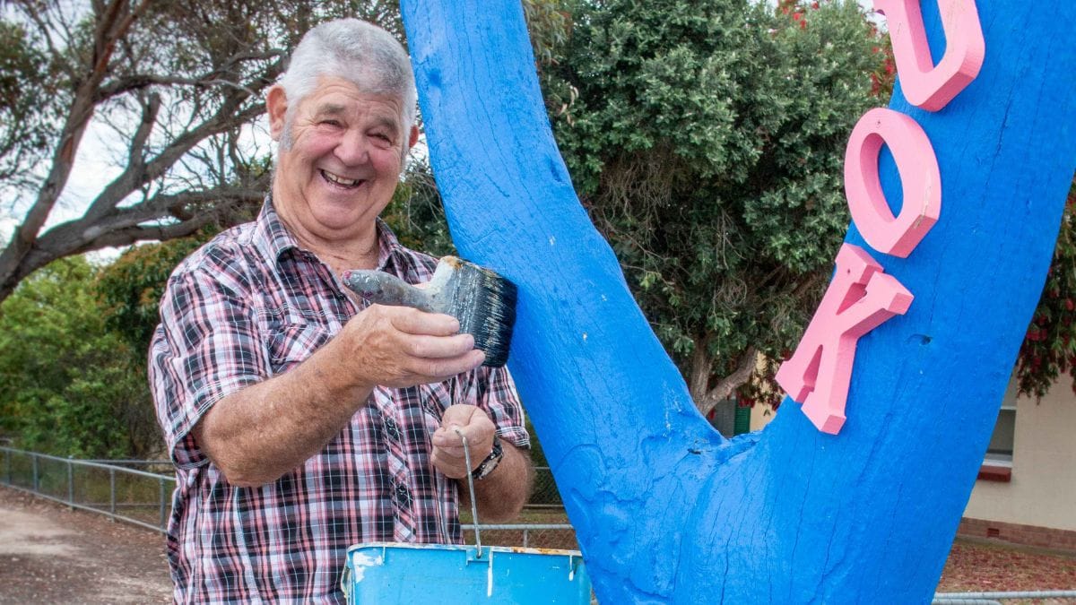 Maurice Hann is painting trees on his journey of resilience