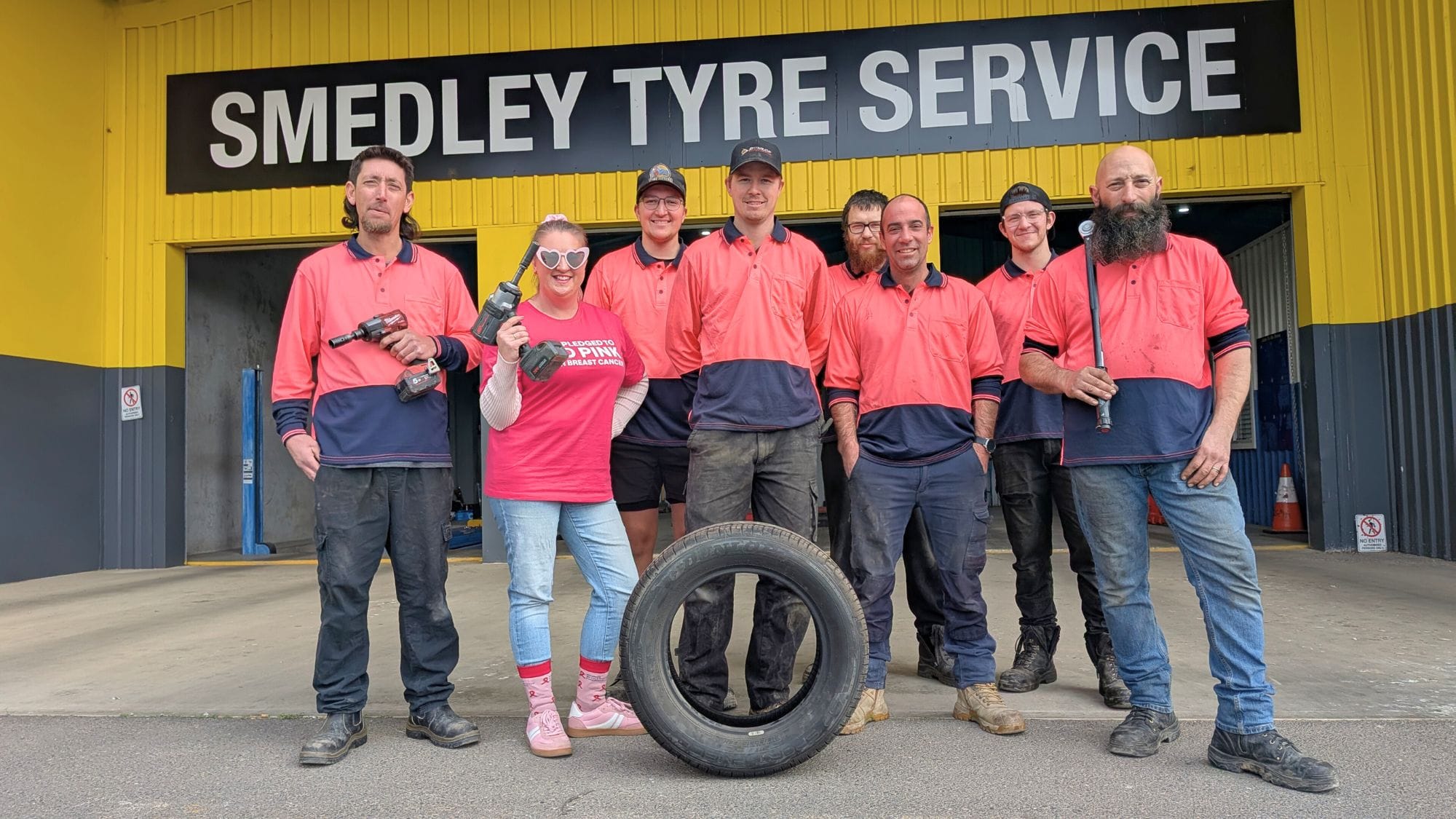 Tyre shop team turns pink for breast cancer fundraiser